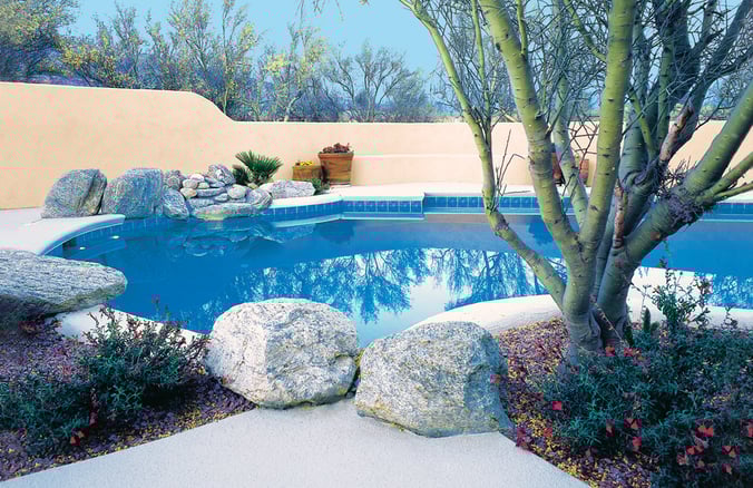 12 Clever Ways for Integrating Stone into Pools—In Photos